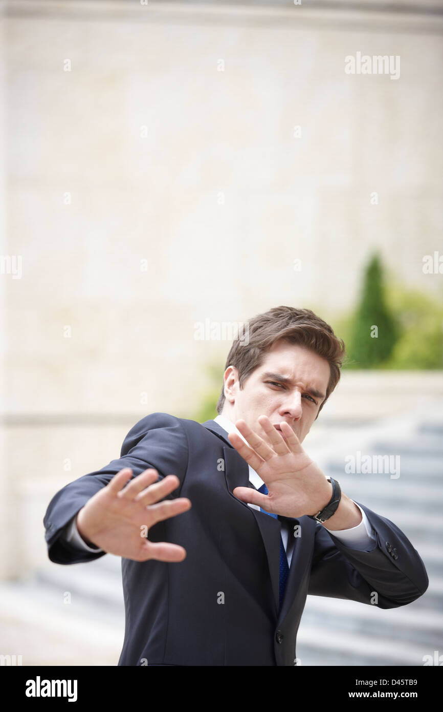 a western businessman with defending pose Stock Photo - Alamy