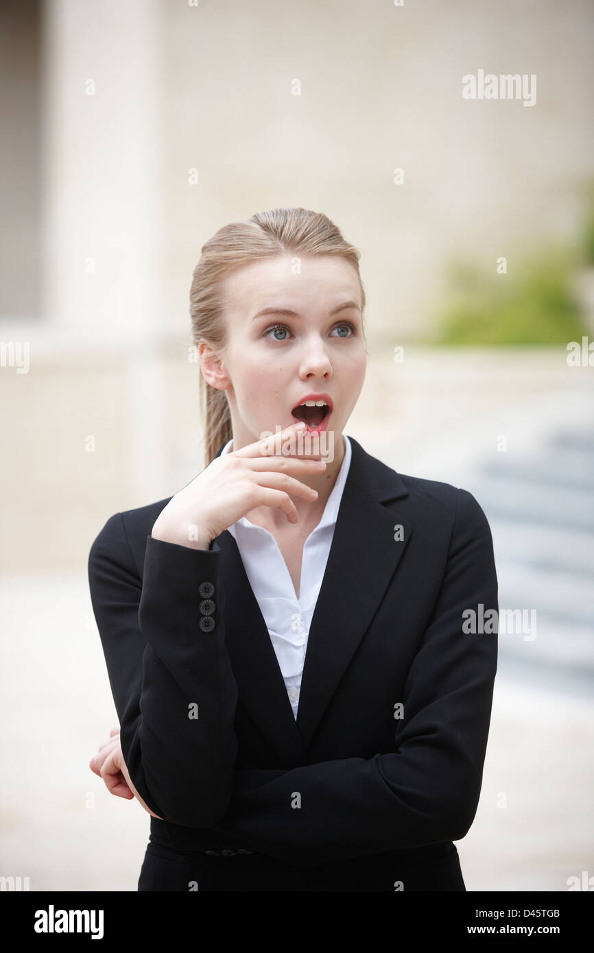 a western businesswoman in thinking pose Stock Photo - Alamy