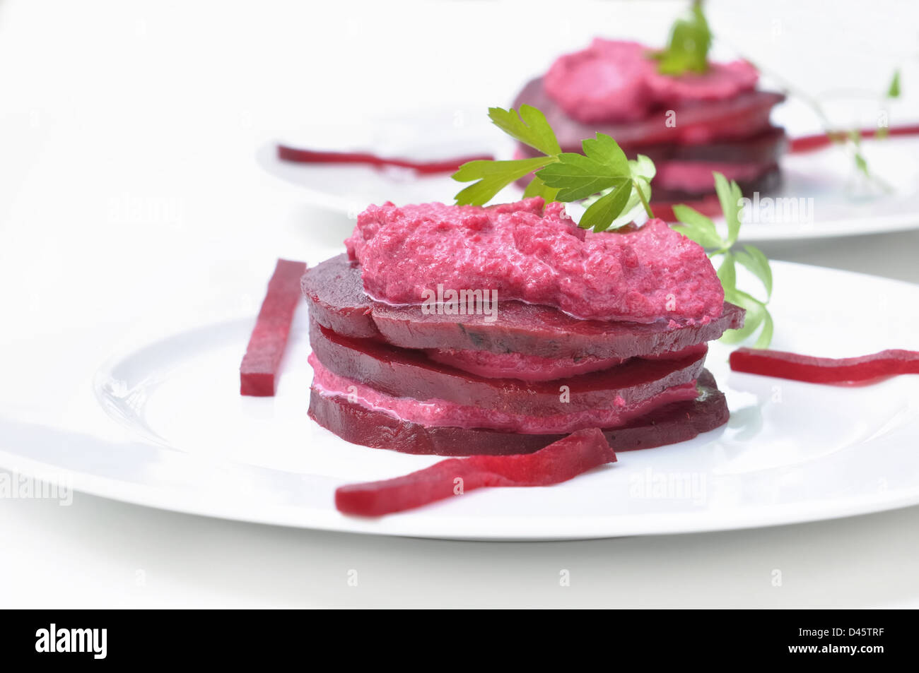 presentation of a foam beet between slices beet forming a yarrow Stock ...