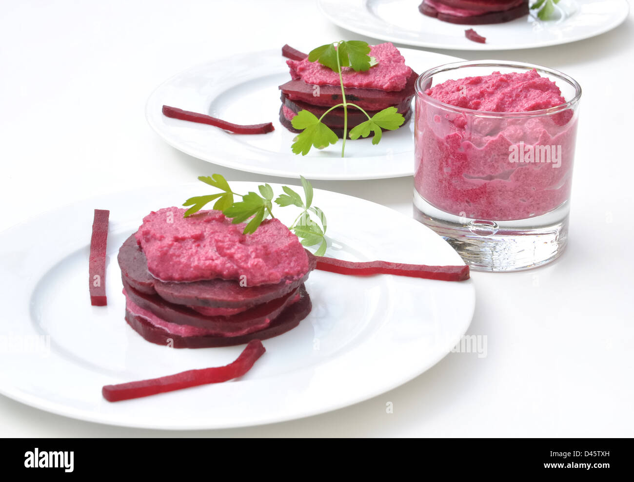 presentation of a foam beet between slices beet forming a yarrow Stock ...