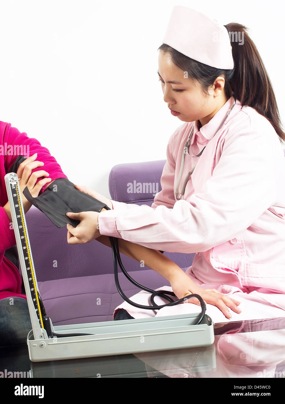 The nurses are measuring blood pressure Stock Photo - Alamy