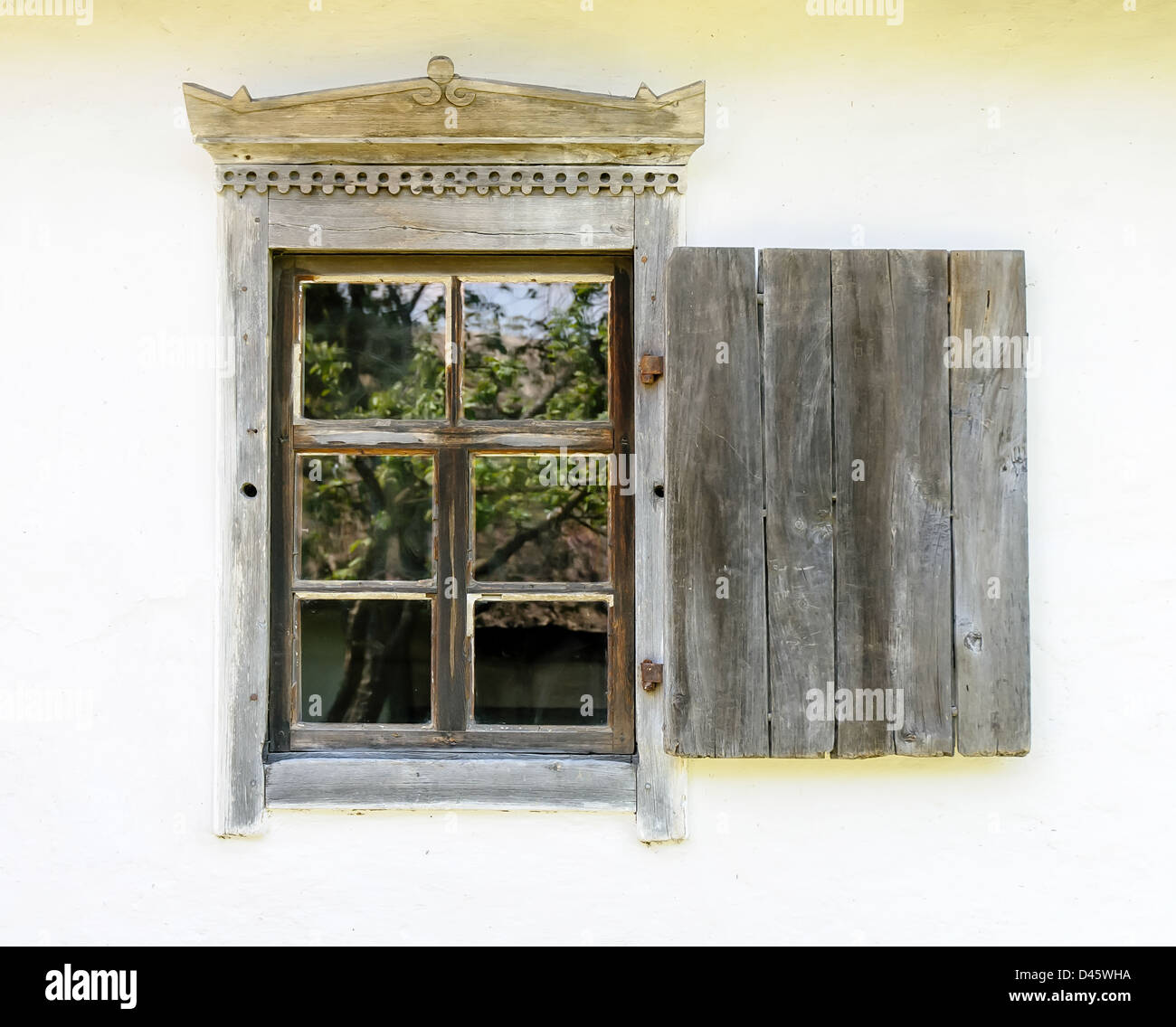 Detail of a window of a typical ukrainian antique house, in Pirogovo ...
