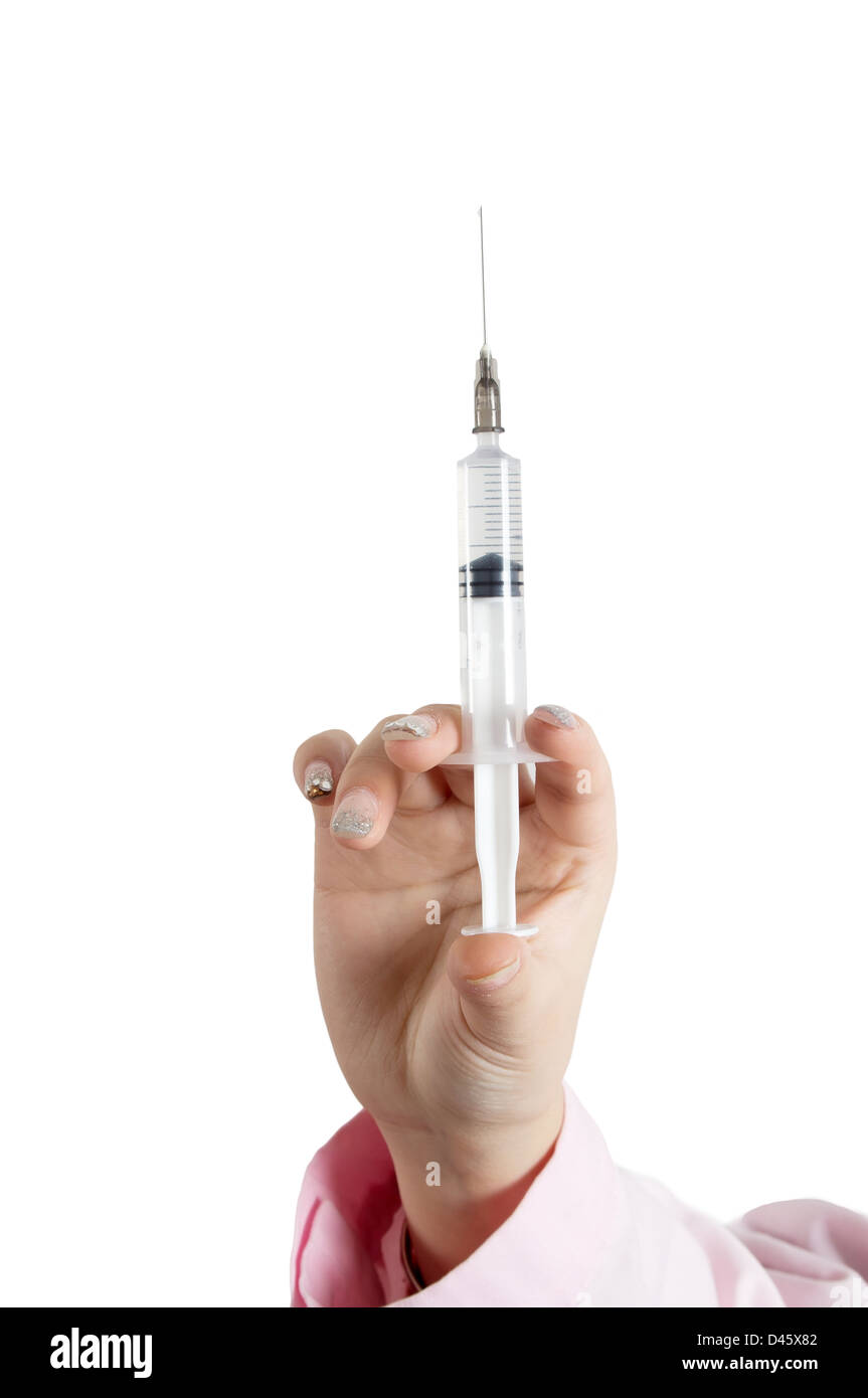 Close-up of hands and syringe Stock Photo - Alamy