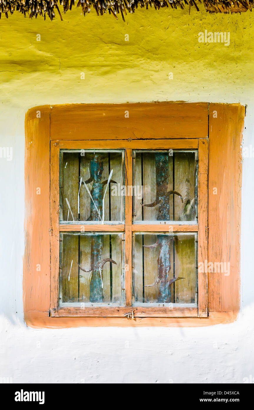Detail of a window of a typical ukrainian antique house, in Pirogovo ...
