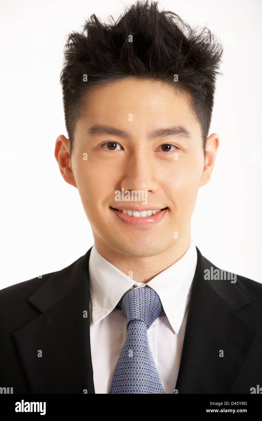Studio Portrait Of Chinese Businessman Stock Photo - Alamy