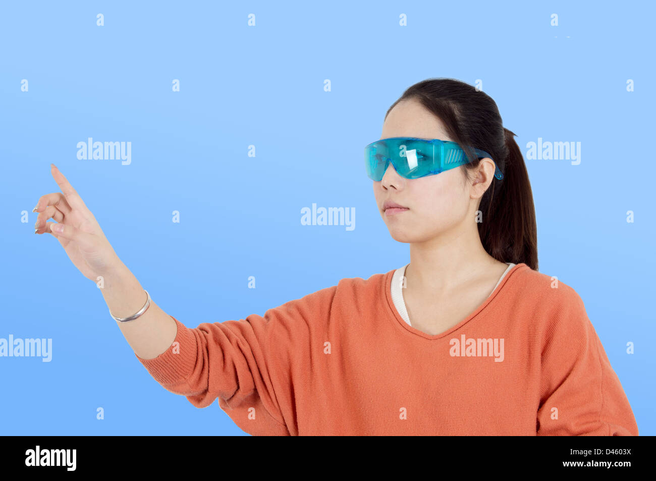 Pretty young lady using hand tap the screen Stock Photo - Alamy