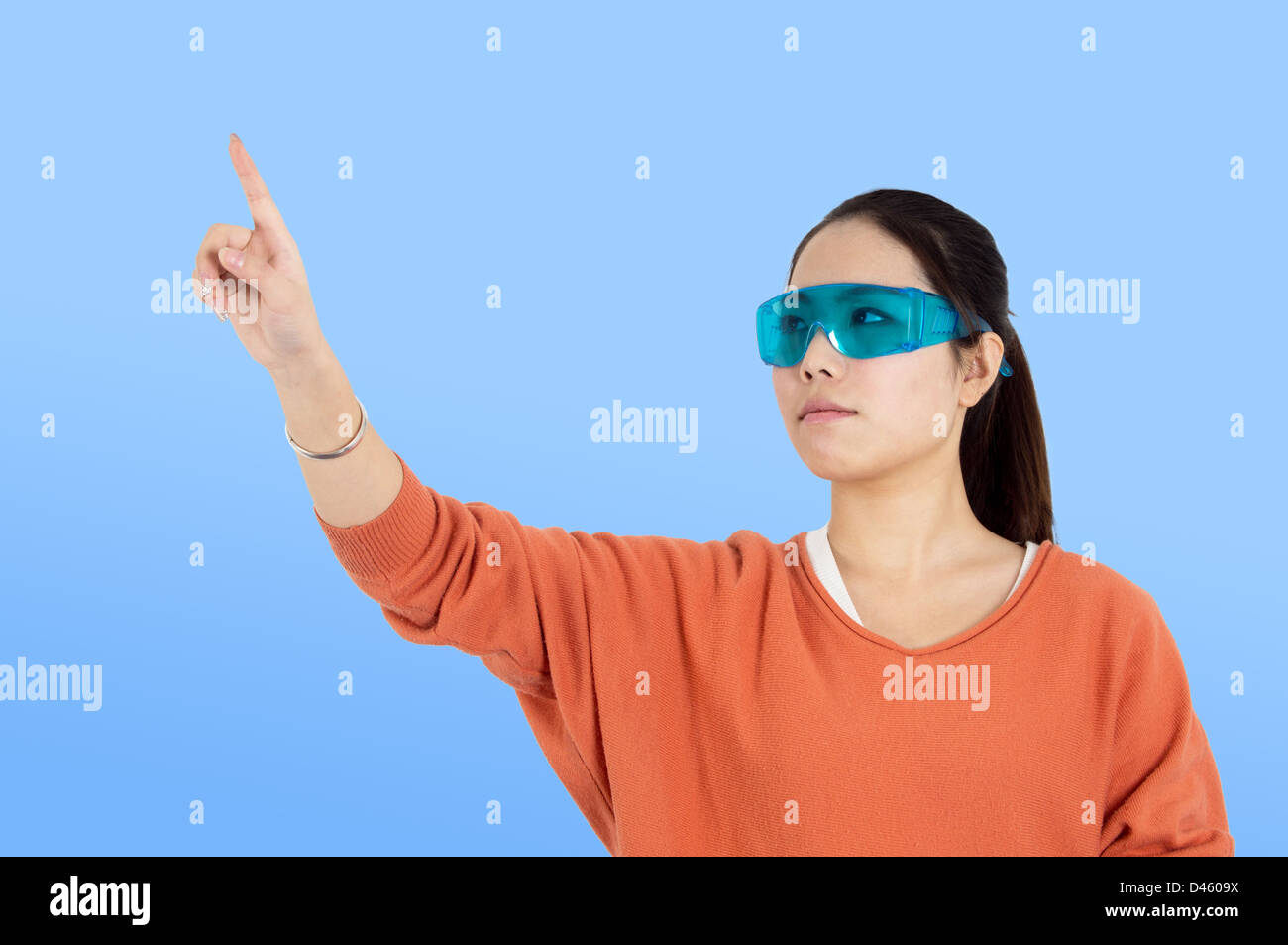 Pretty young lady using hand tap the screen Stock Photo - Alamy