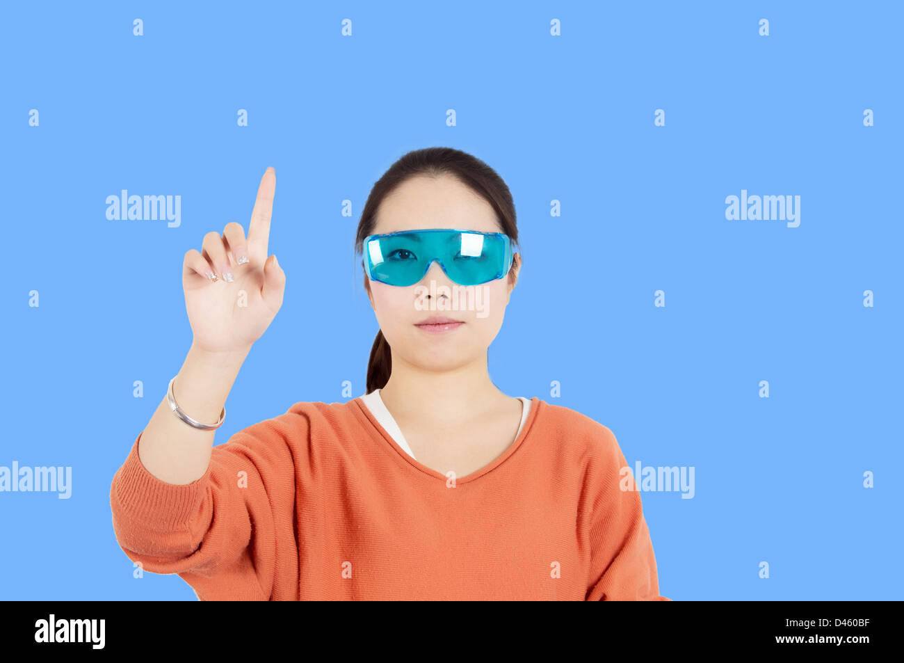 Pretty young lady using hand tap the screen Stock Photo - Alamy