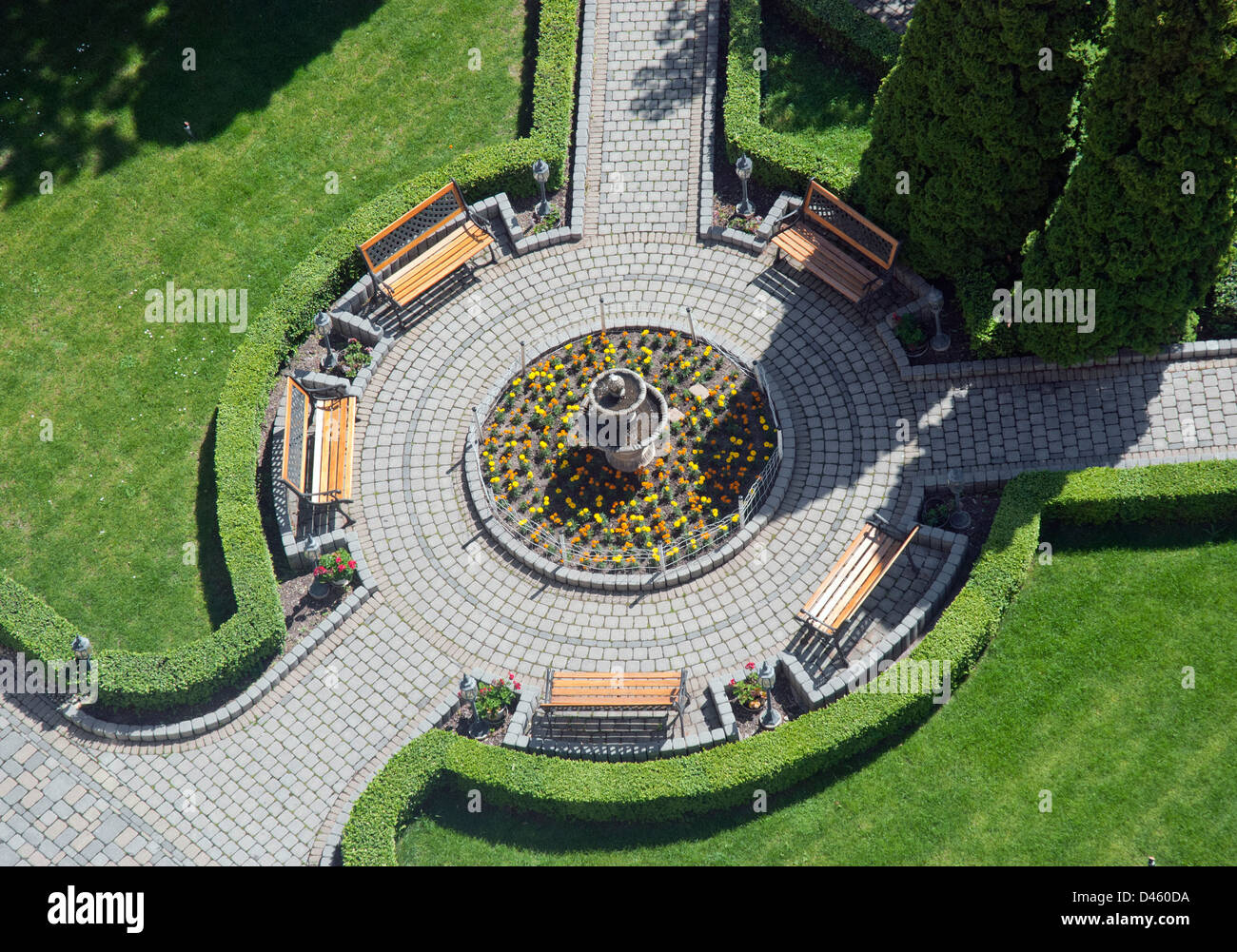 Wooden benches in the flowering garden. View from above Stock Photo - Alamy