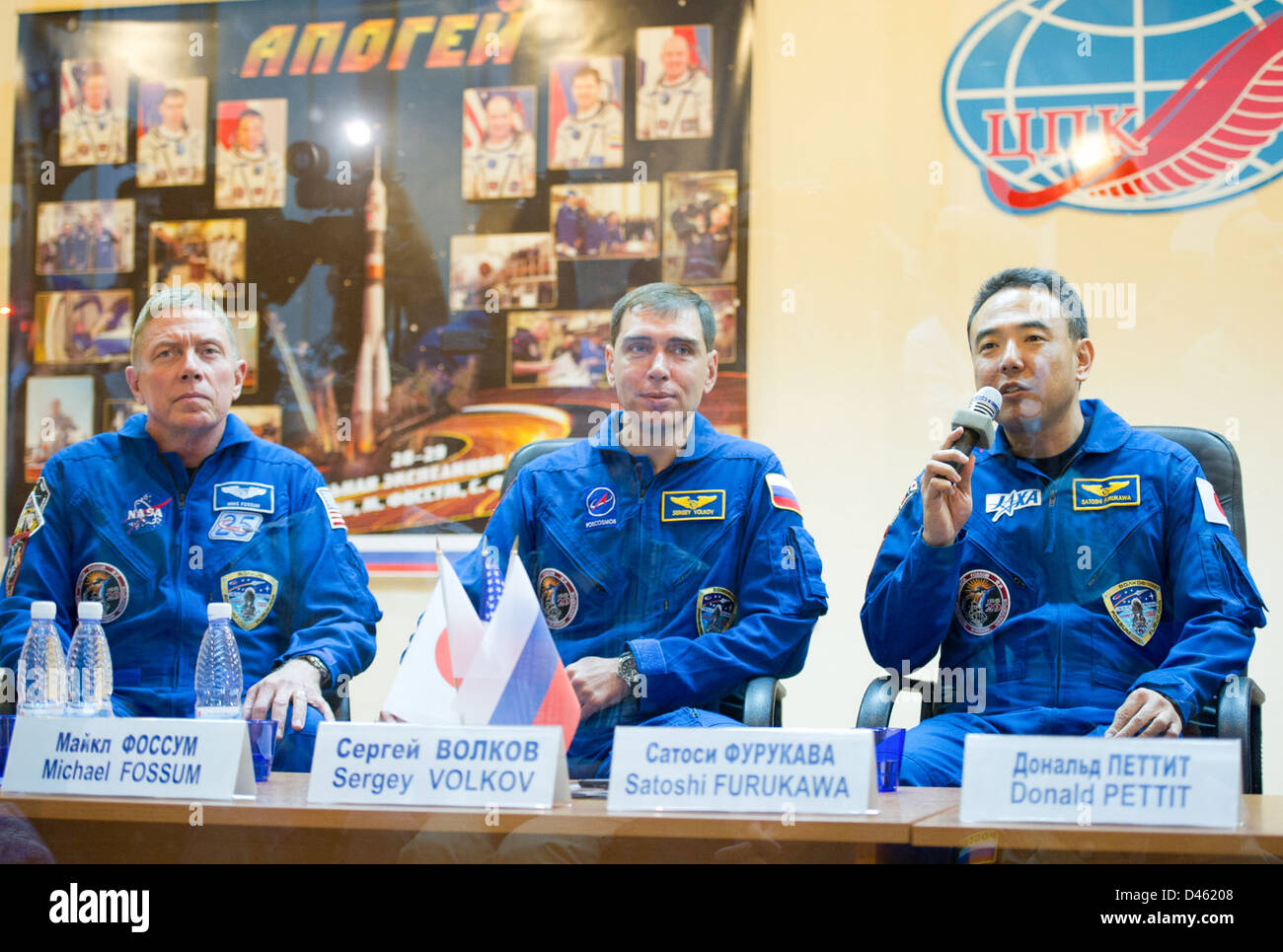 NASA astronaut Mike Fossum, JAXA astronaut Satoshi Furukawa, and ...