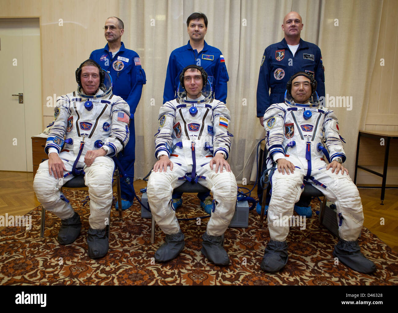 The Expedition 28 crew, including astronauts from NASA, ESA, JAXA, and ...
