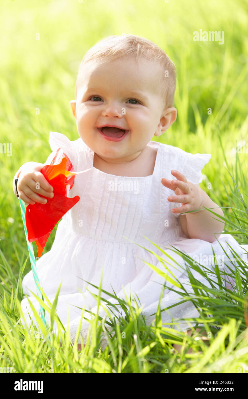 Baby holding windmill hi-res stock photography and images - Alamy