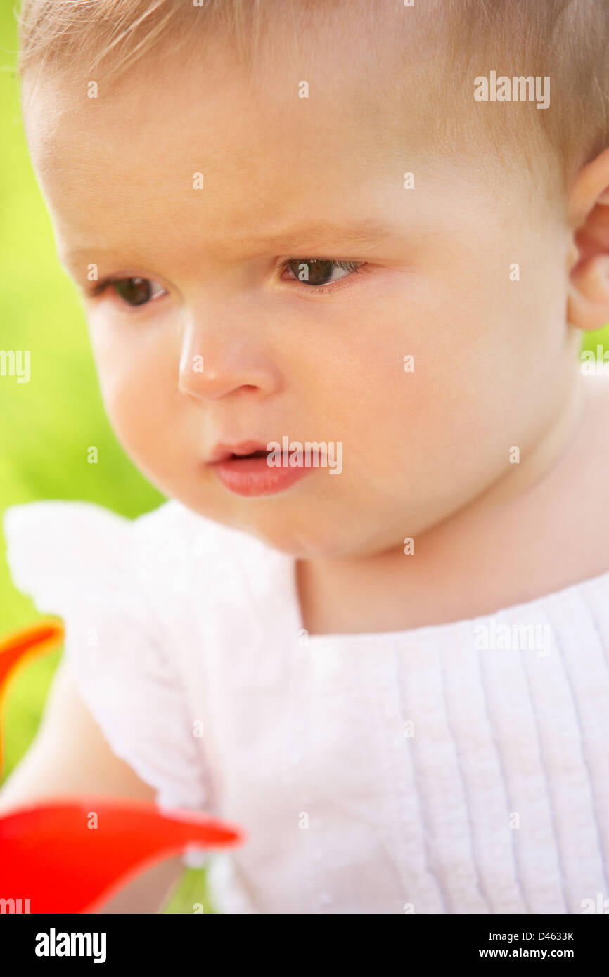 Baby holding windmill hi-res stock photography and images - Alamy