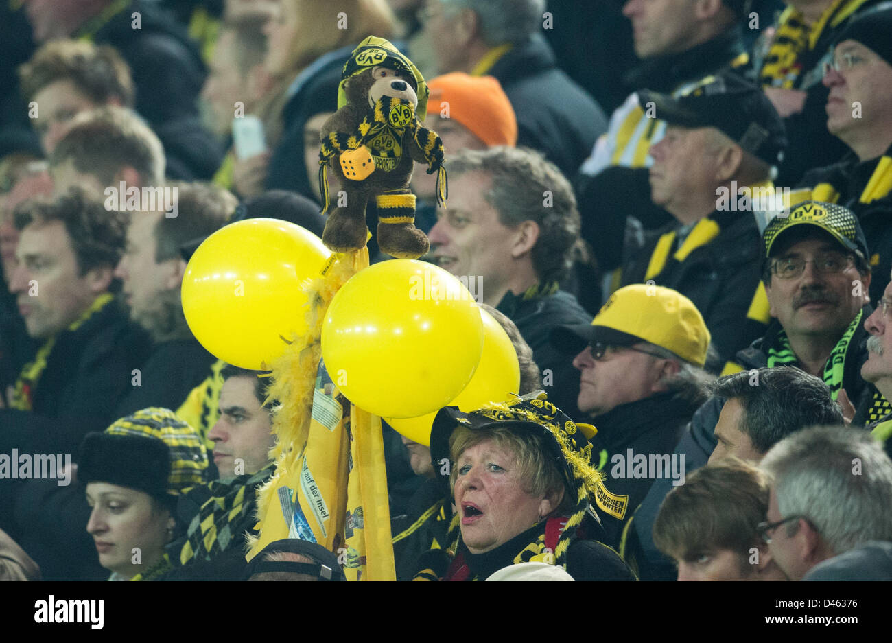 Dortmund, Germany. 5th March 2013. Dortmund Supporters with a teddy ...