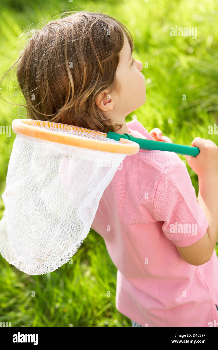 Young Boy In Field With Insect Net Stock Photo - Alamy
