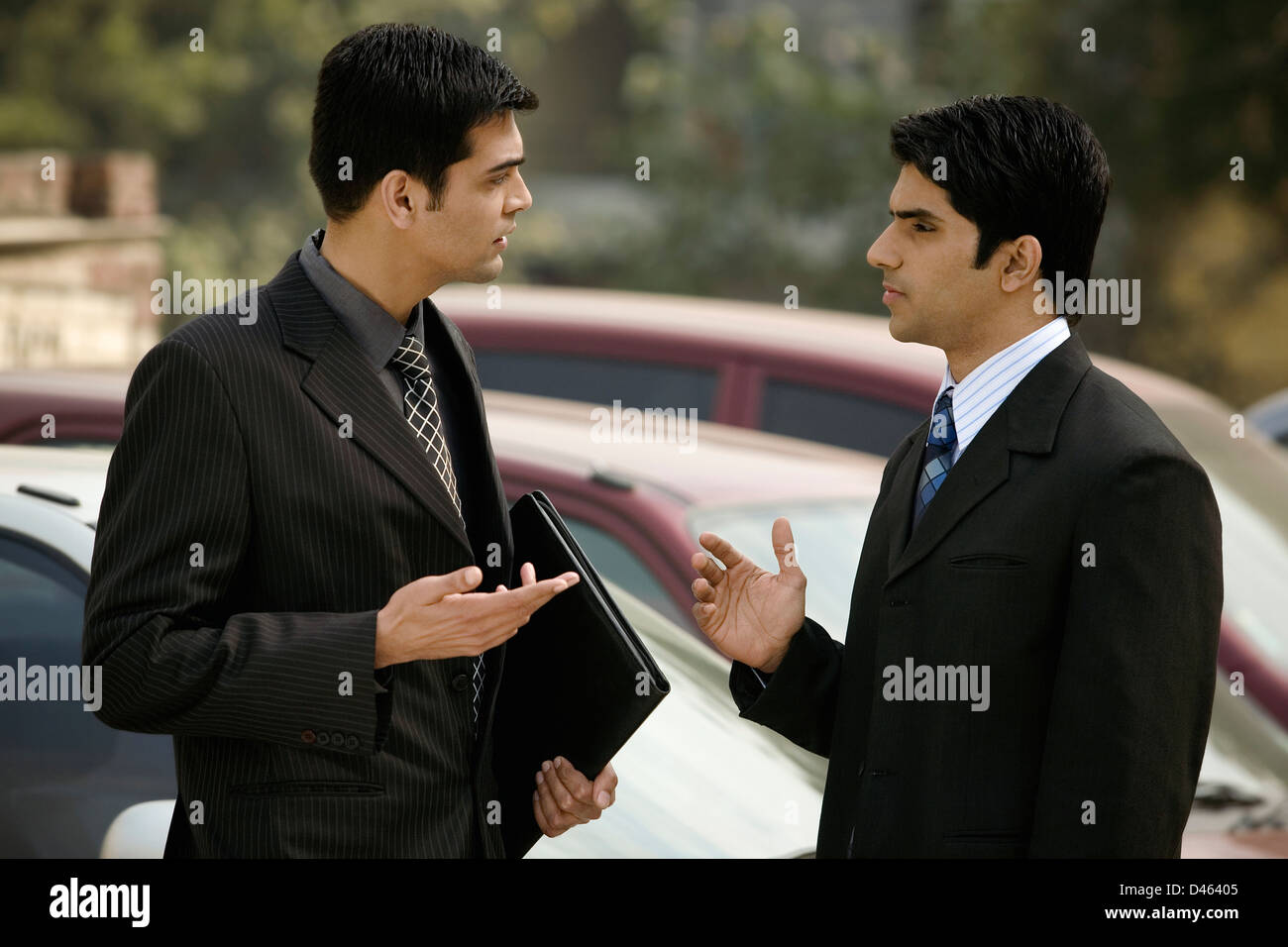 Businessmen having a discussion Stock Photo - Alamy