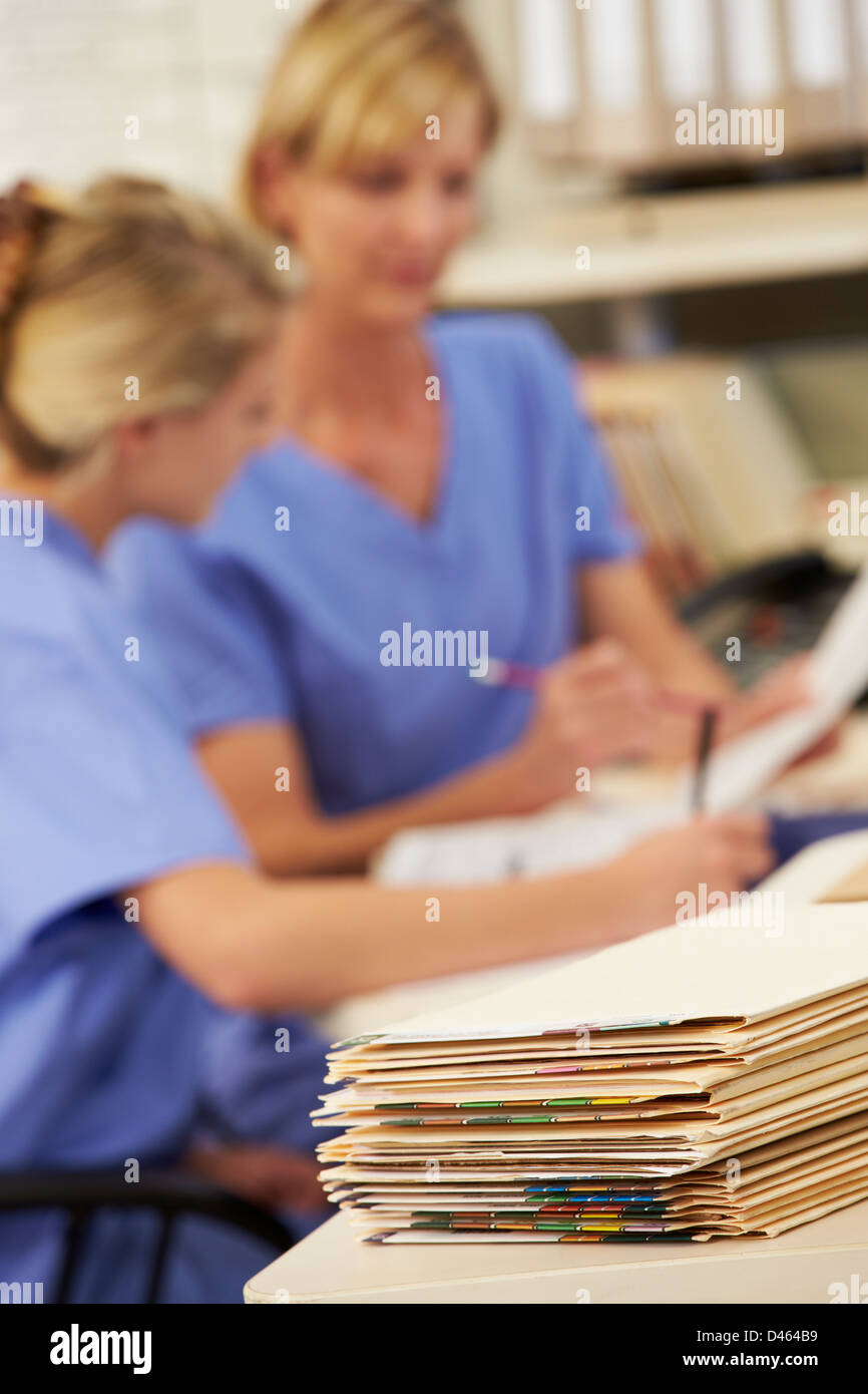 Patient Records On Desk At Nurses Station Stock Photo - Alamy
