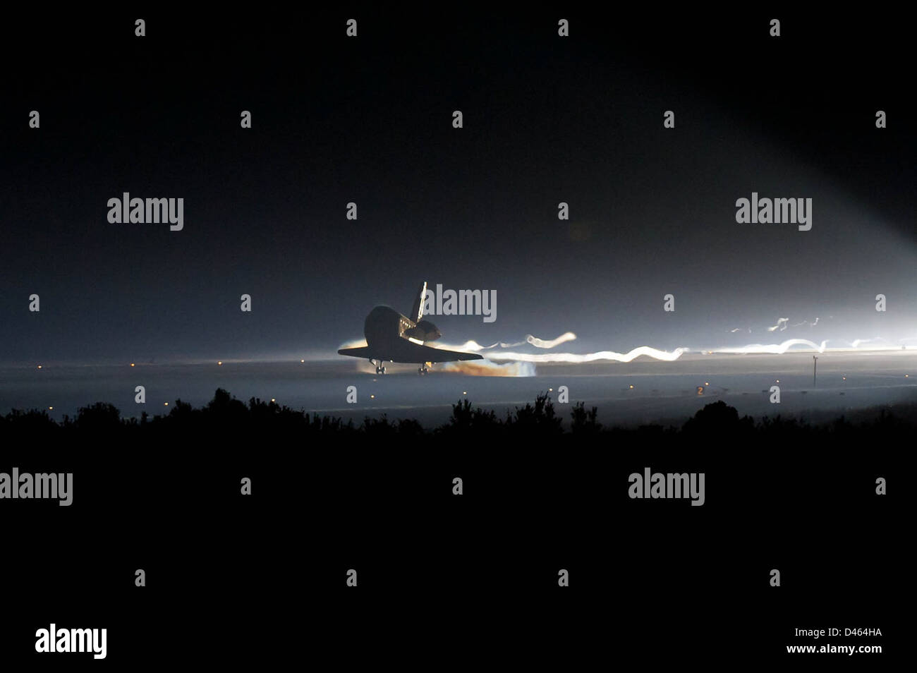 The Space Shuttle Atlantis lands after completing its final mission ...