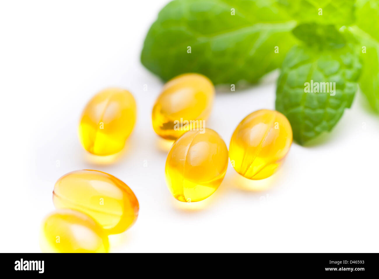 Fish oil nutritional supplement capsules on white background Stock ...