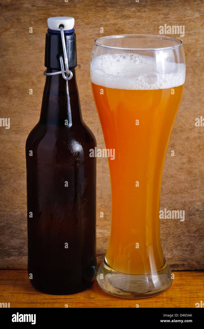 Glass and bottle of bavarian beer on a wooden background Stock Photo ...