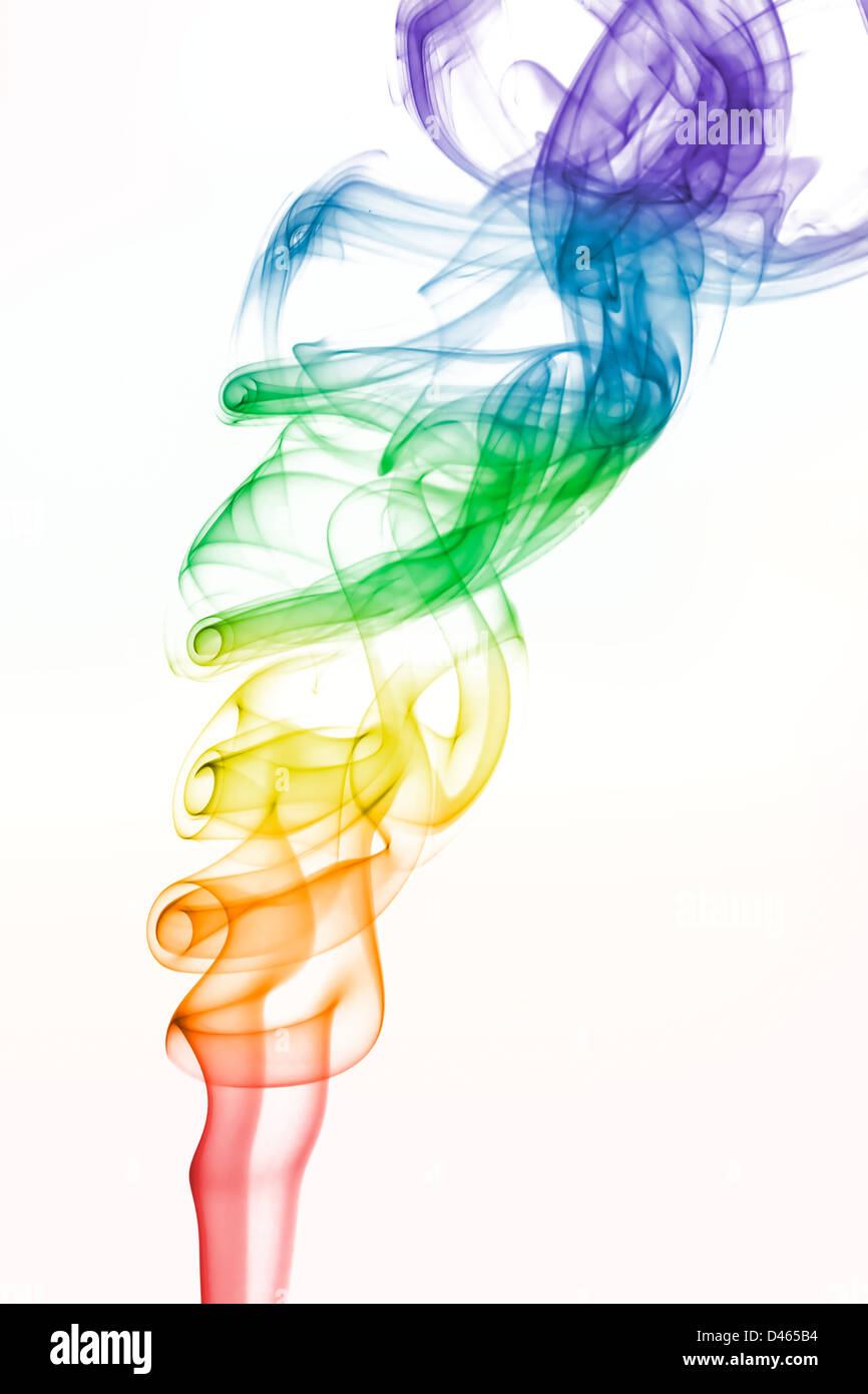 Rainbow colored smoke pattern on white Stock Photo - Alamy