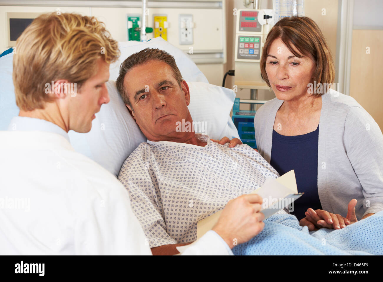 Doctor Talking Couple On Ward High Resolution Stock Photography and ...
