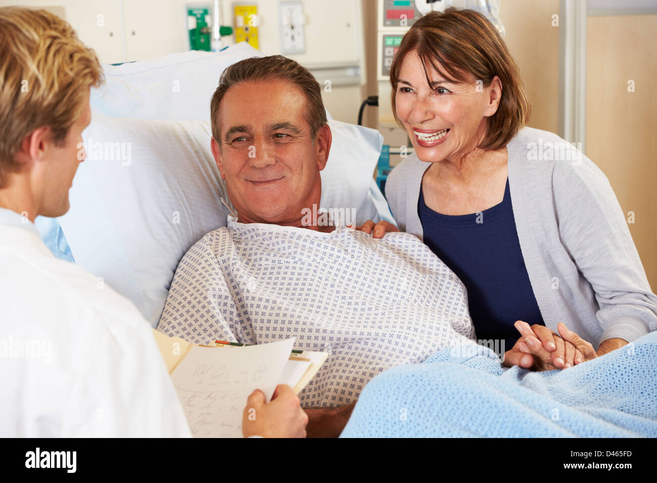 Woman bed hospital husband mature hi-res stock photography and images ...