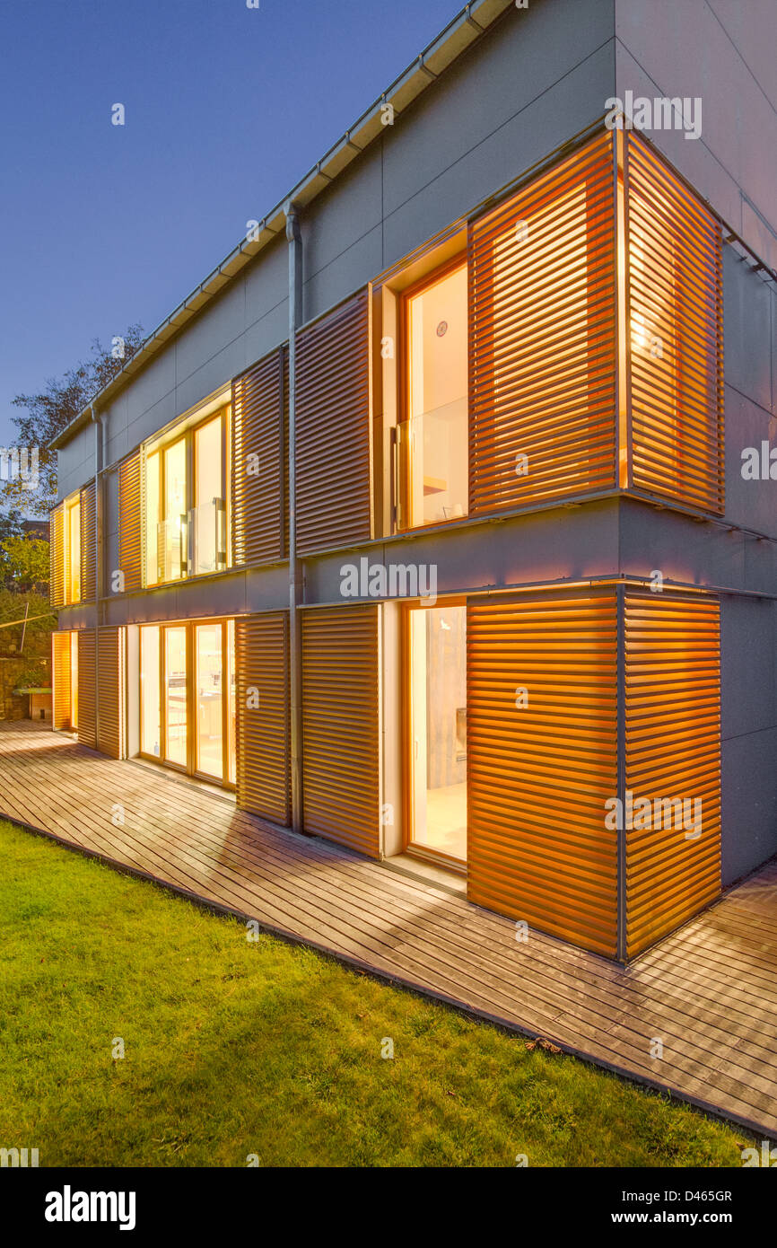 Modern house in evening Stock Photo - Alamy