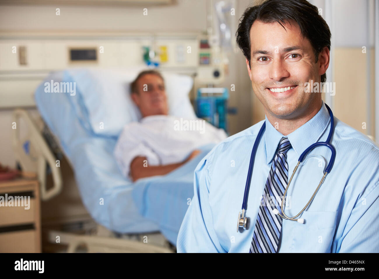 Portrait Of Doctor With Patient In Background Stock Photo - Alamy