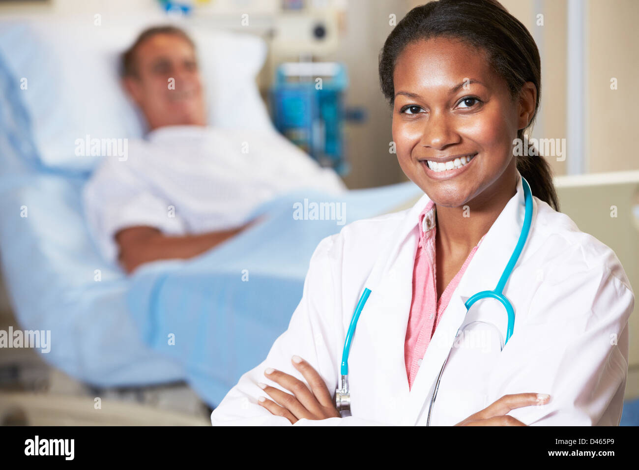 Portrait Of Doctor With Patient In Background Stock Photo - Alamy