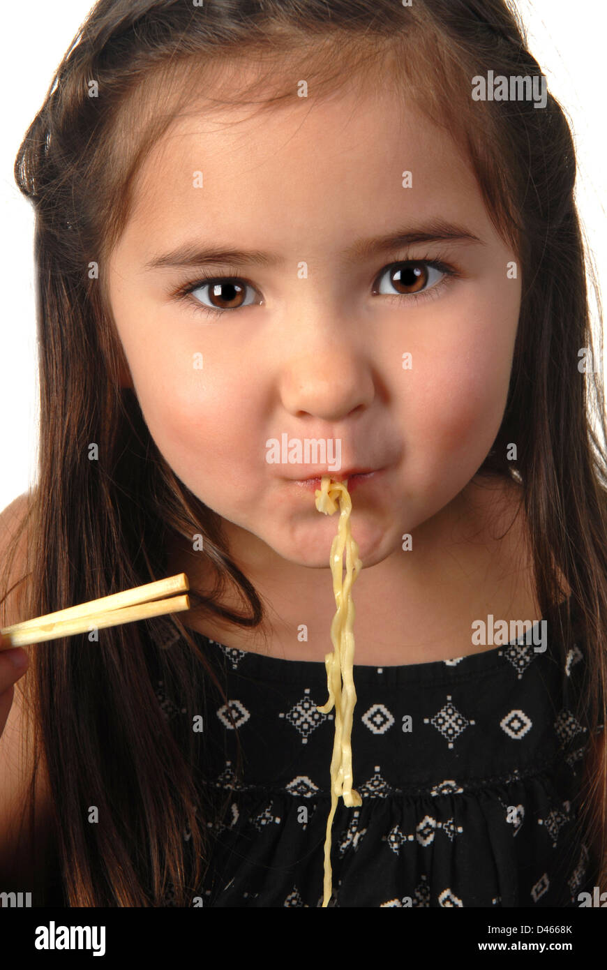 Pretty young girl slurping her noodle soup Stock Photo - Alamy