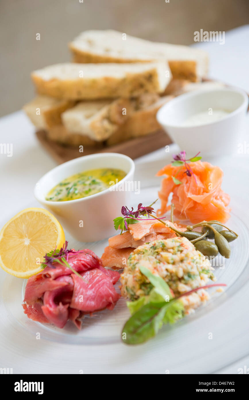 Fish platter salad with bread Stock Photo - Alamy