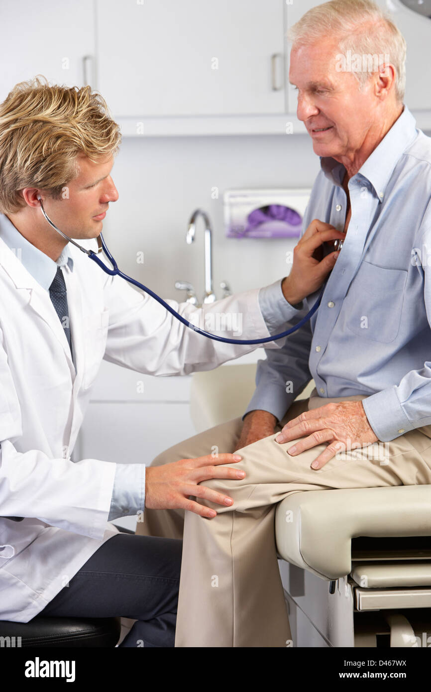 Doctor Examining Male Patients Chest Stethoscope High Resolution Stock ...