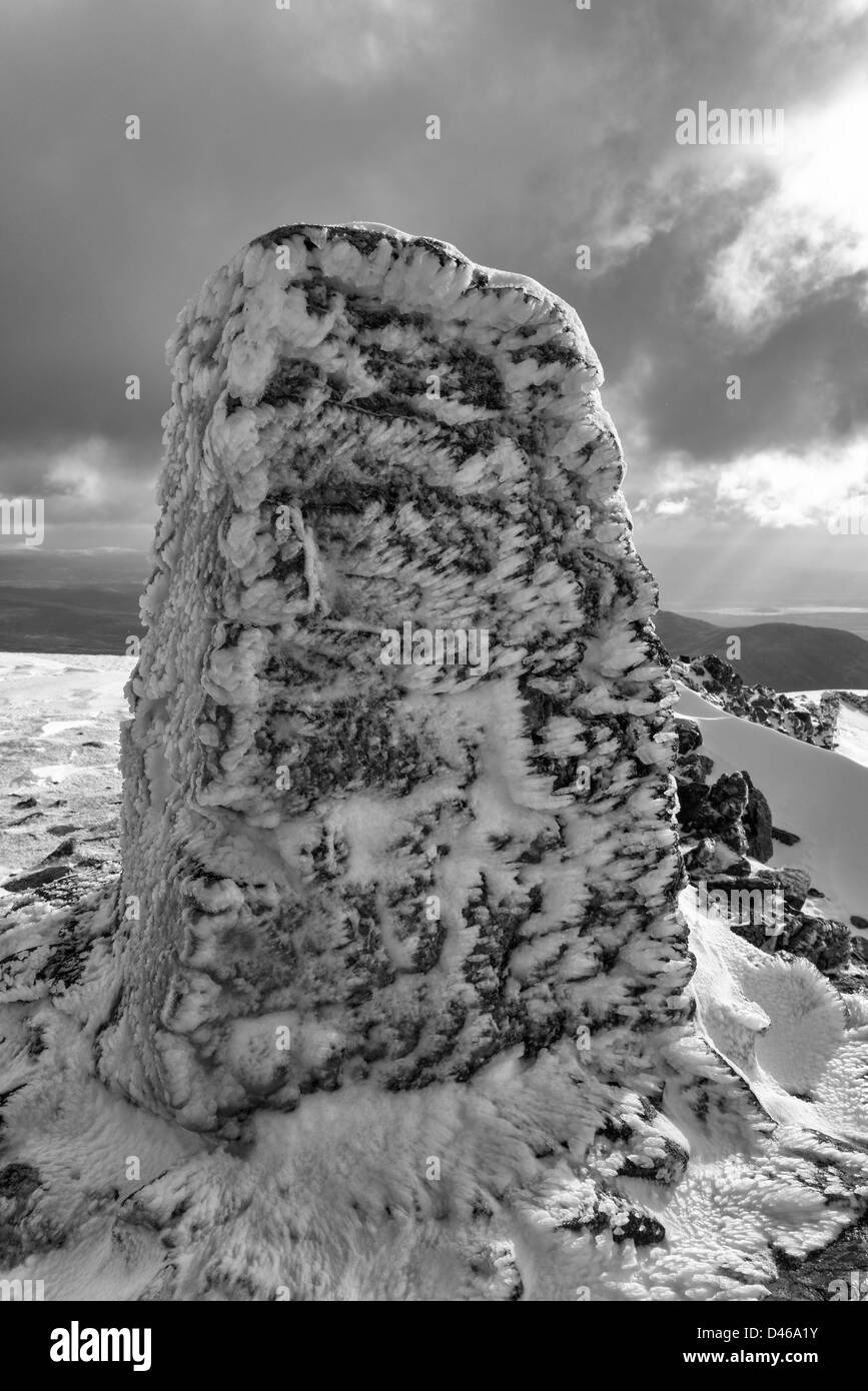 The summit trig point on Moel Hebog in winter Stock Photo - Alamy