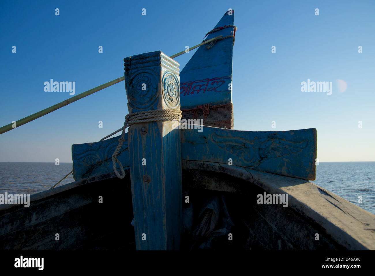A carved bow of a traditional trawler fishing of the coast of ...