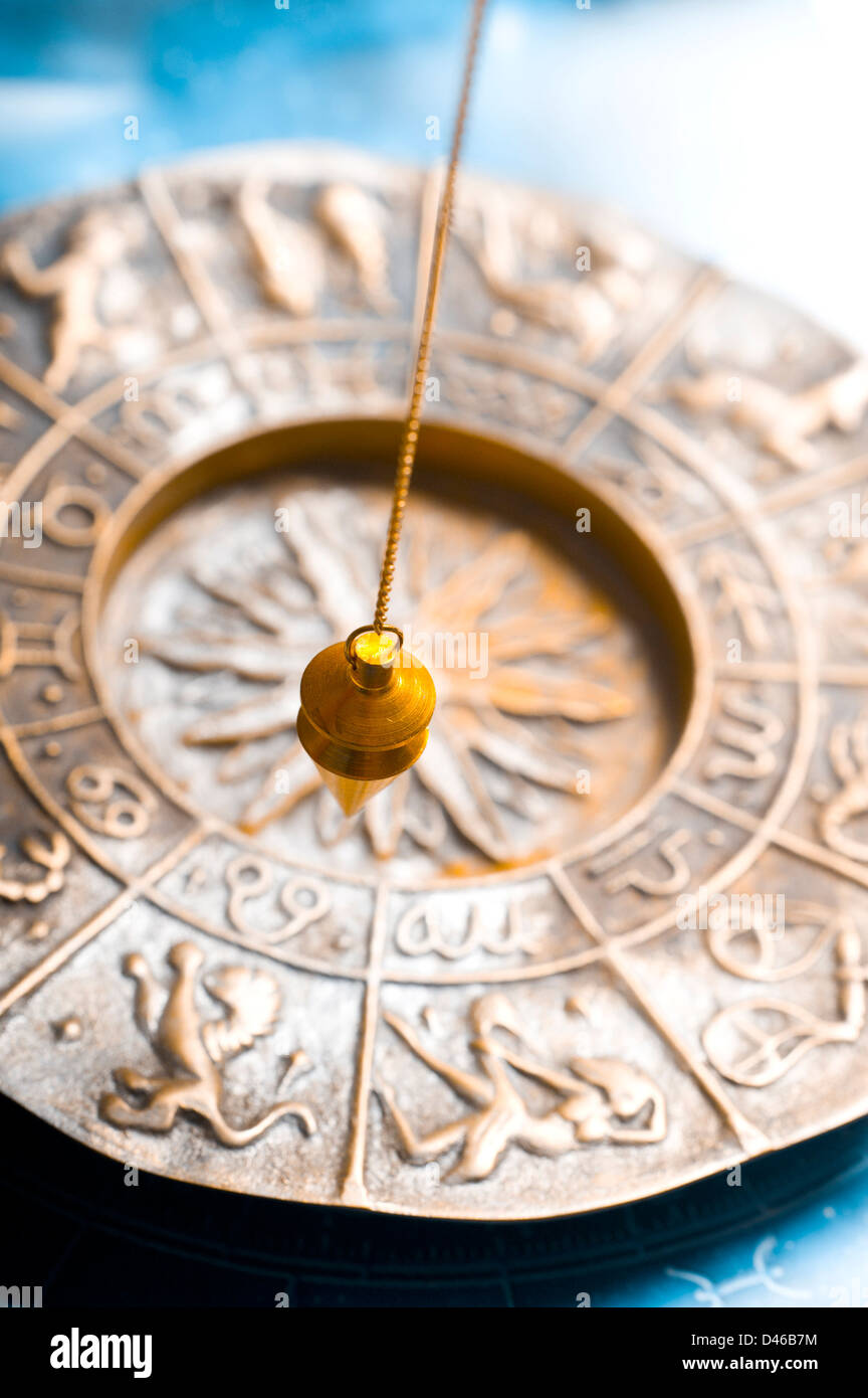 astrology and pendulum Stock Photo - Alamy