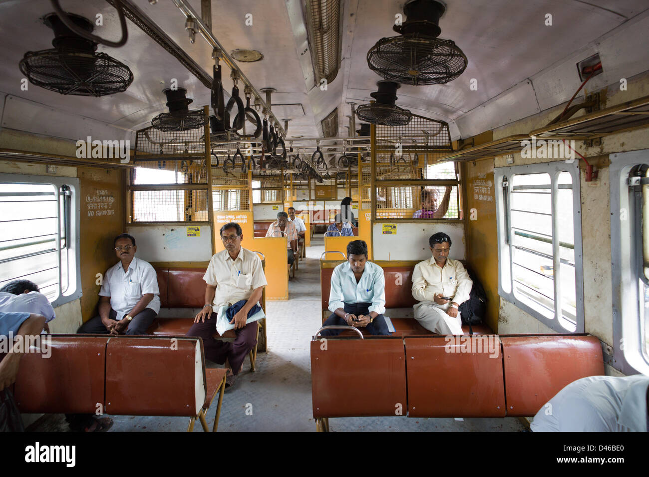 Women and men are sitting together in a mixed train compartment of the ...
