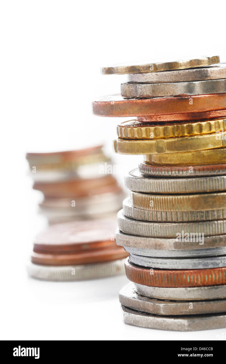 Old coins on white background Stock Photo - Alamy