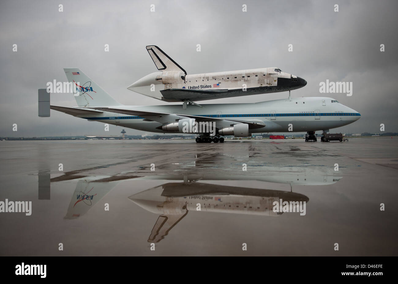 Space Shuttle Discovery is prepared for demating from its 747 Shuttle ...