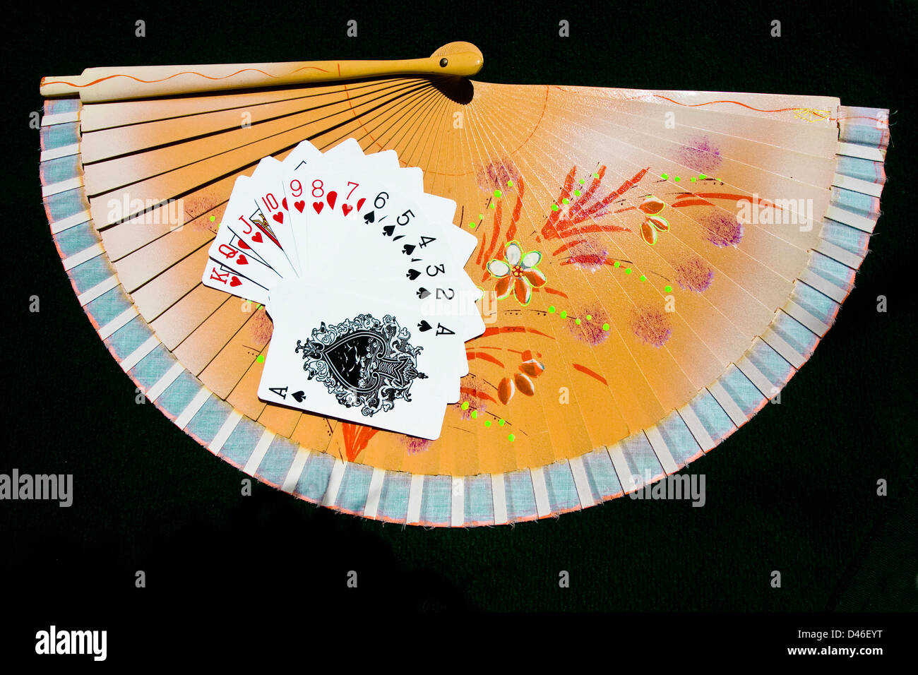 Two houses of Hearts and Spades playing cards put streetwise King to ...