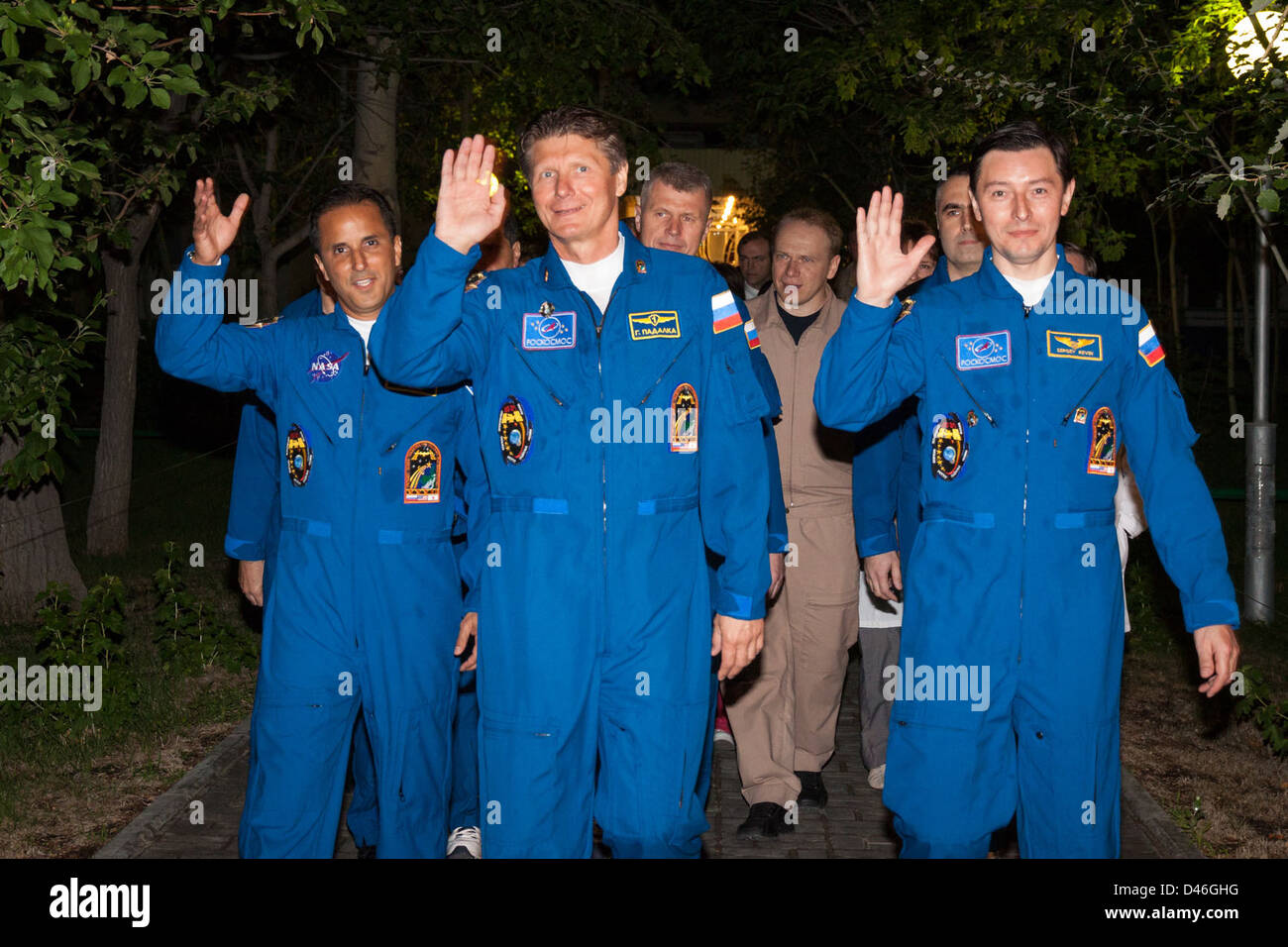 Expedition 31 crew members, including NASA astronaut Joe Acaba, prepare ...