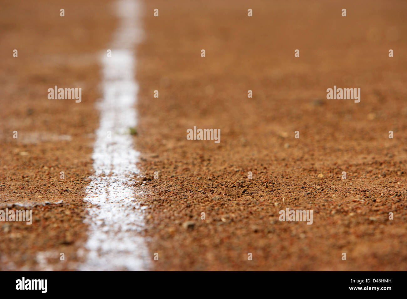 A white line on a sports field in the dirt Stock Photo - Alamy