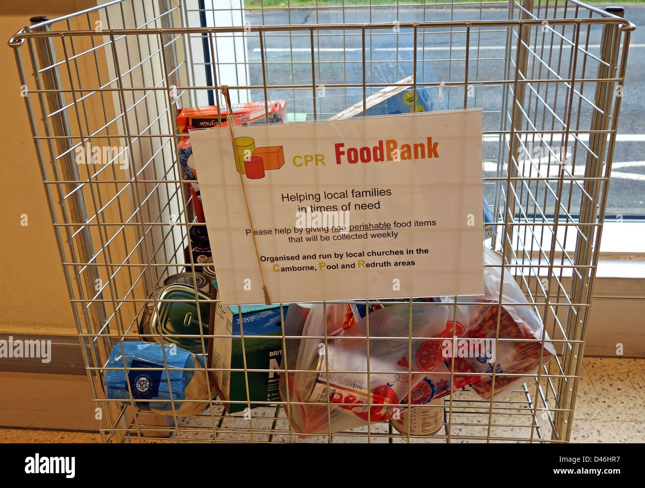 A Foodbank collection point in a Tesco store Stock Photo - Alamy
