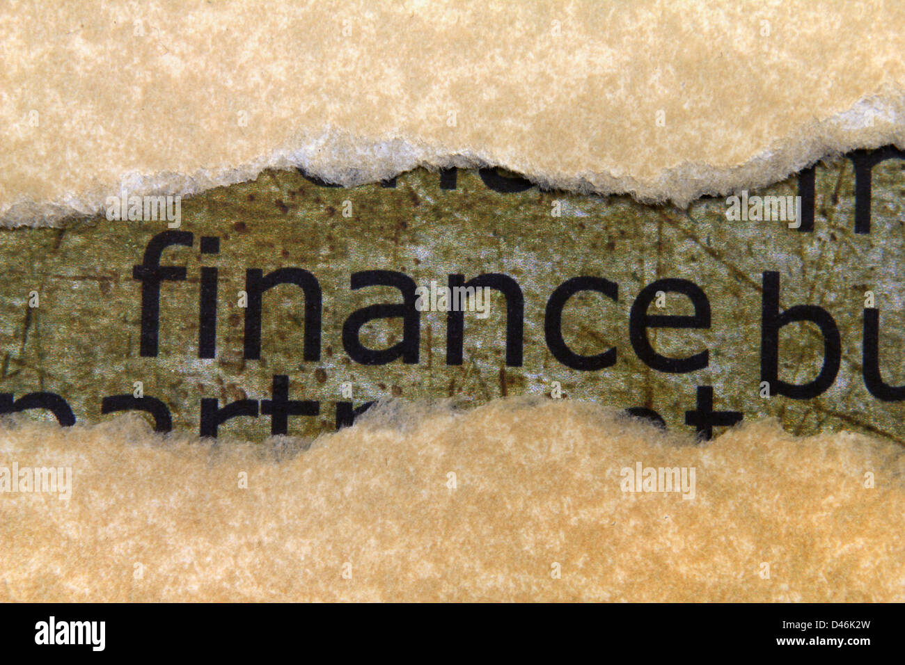 Finance text on paper hole Stock Photo - Alamy