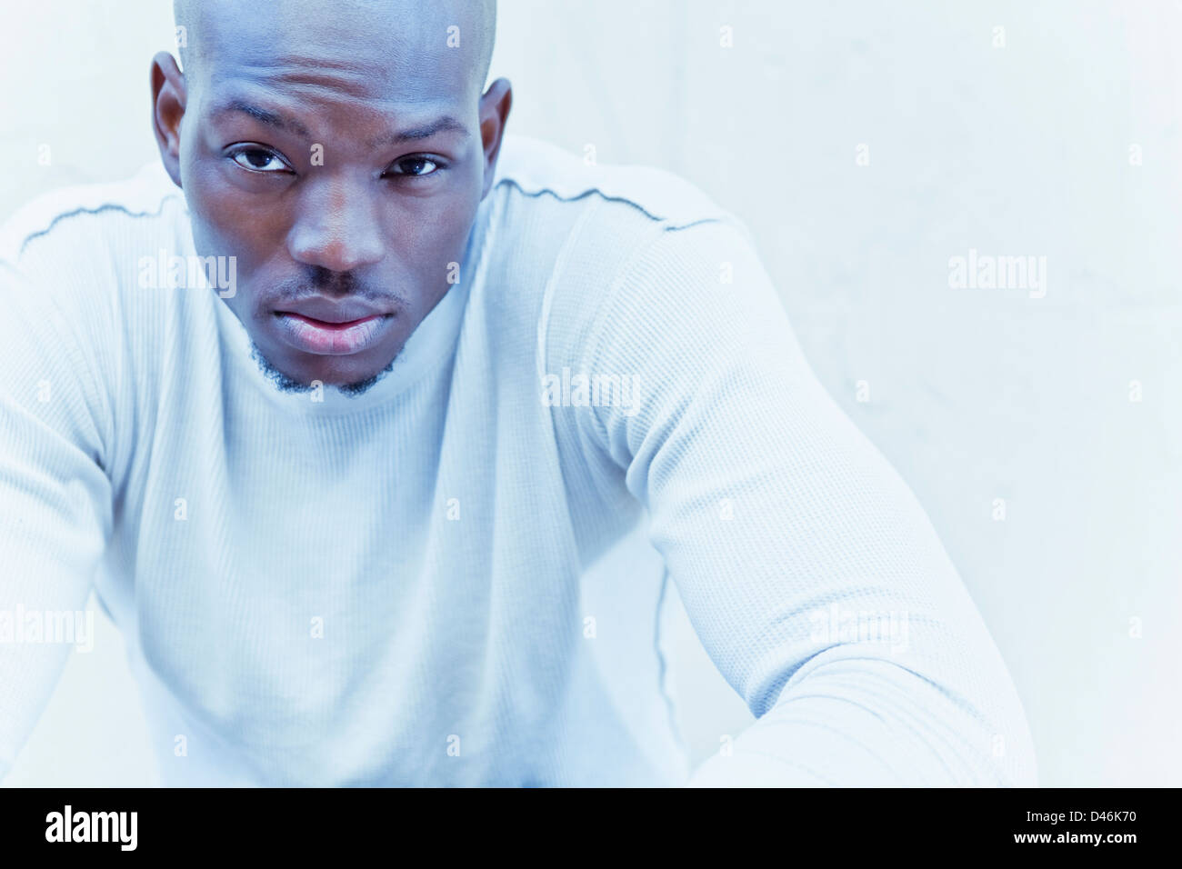 Portrait of handsome young black man with problems Stock Photo - Alamy