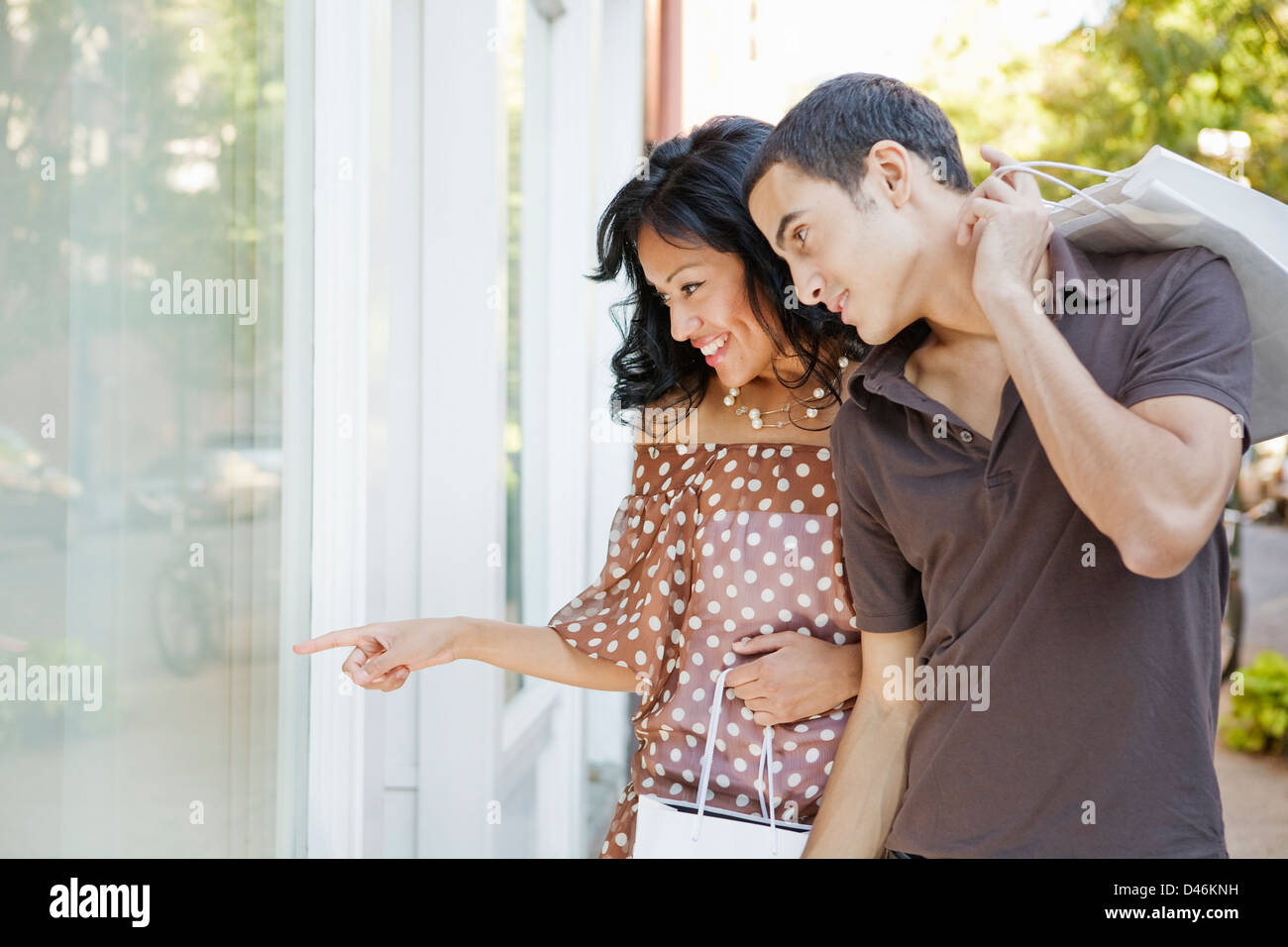 Hispanic-Latino Couple Enjoying a Shopping Lifestyle in New York Stock ...