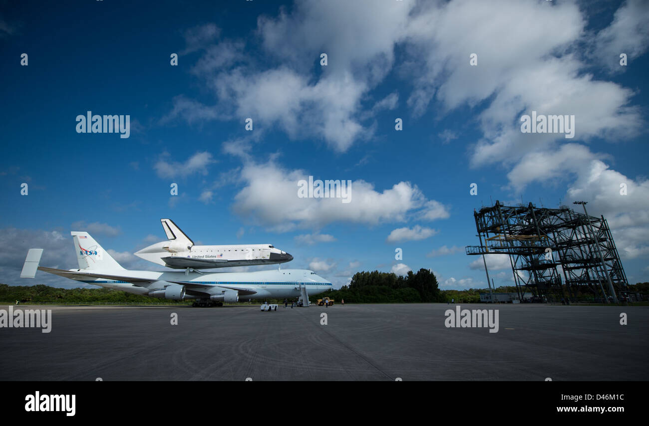 The Space Shuttle Endeavour is seen being transported atop the 747 ...