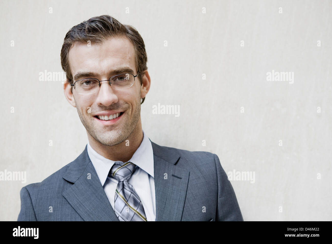 Portrait of a man wearing a suit Stock Photo - Alamy