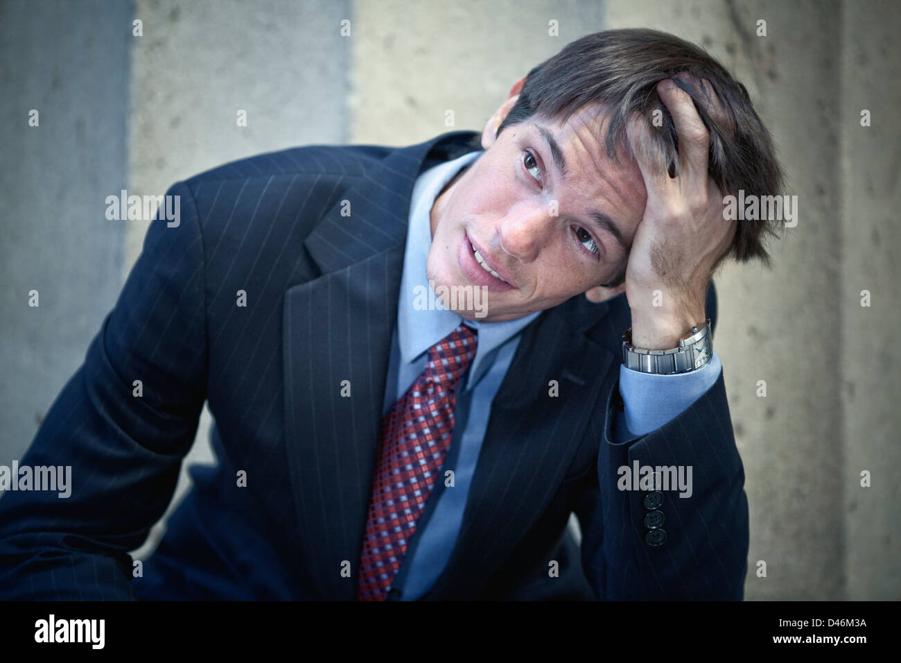 a man bothered with something Stock Photo - Alamy