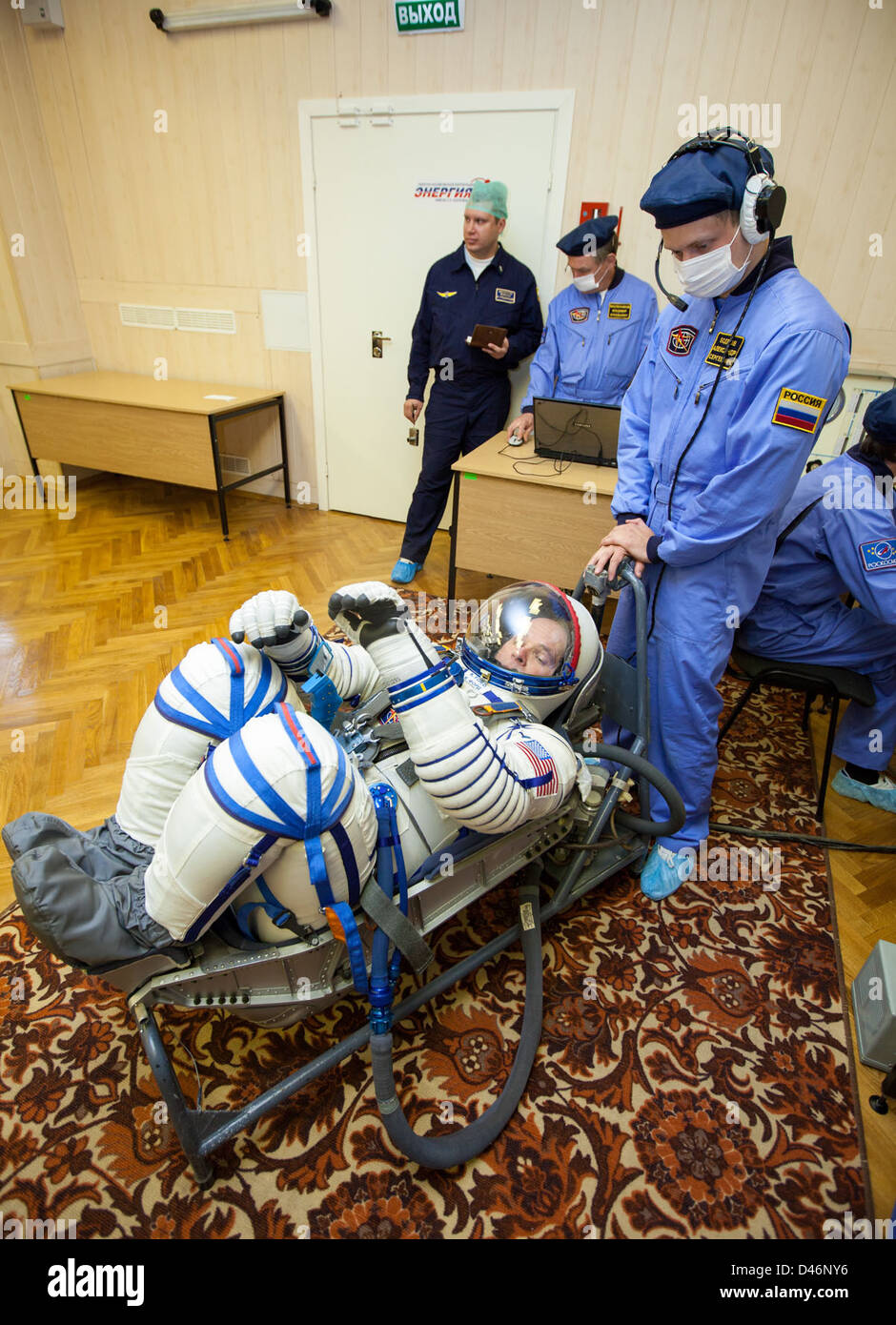 NASA astronaut Kevin Ford suits up in his Russian Sokol suit at the ...